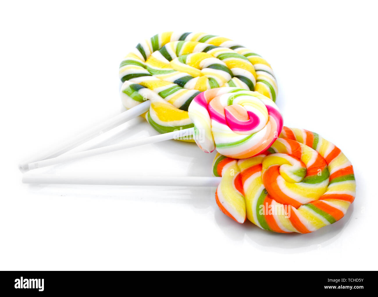 Colorful lollipops isolated on white Stock Photo - Alamy