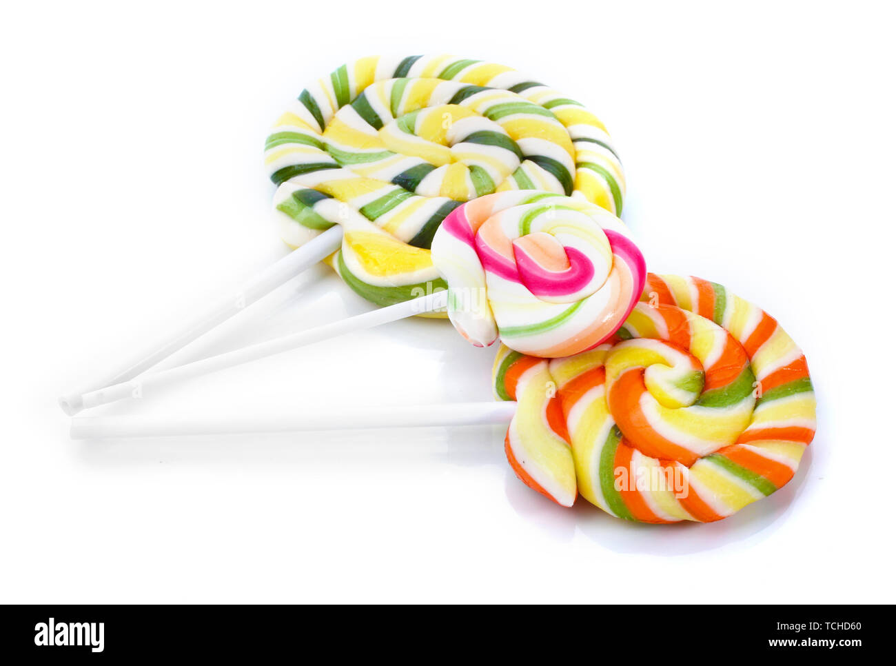 Colorful lollipops isolated on white Stock Photo - Alamy