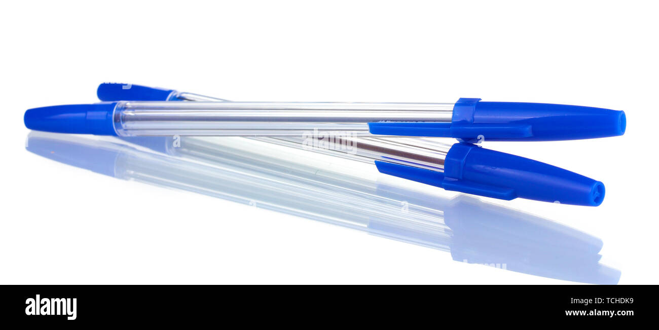 two blue pens isolated on white Stock Photo - Alamy