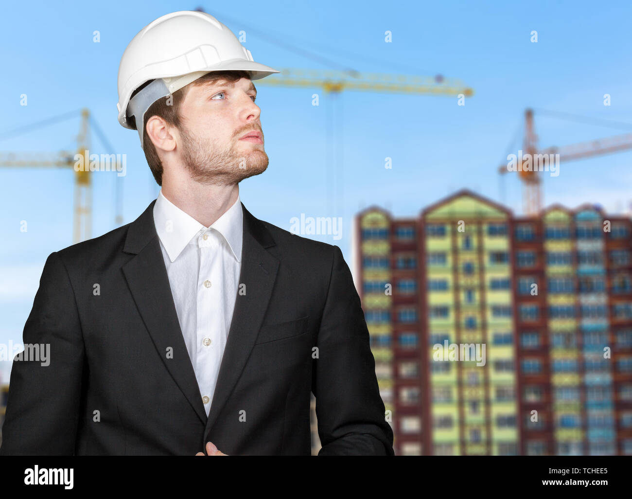 Successful male architect at a building site Stock Photo - Alamy