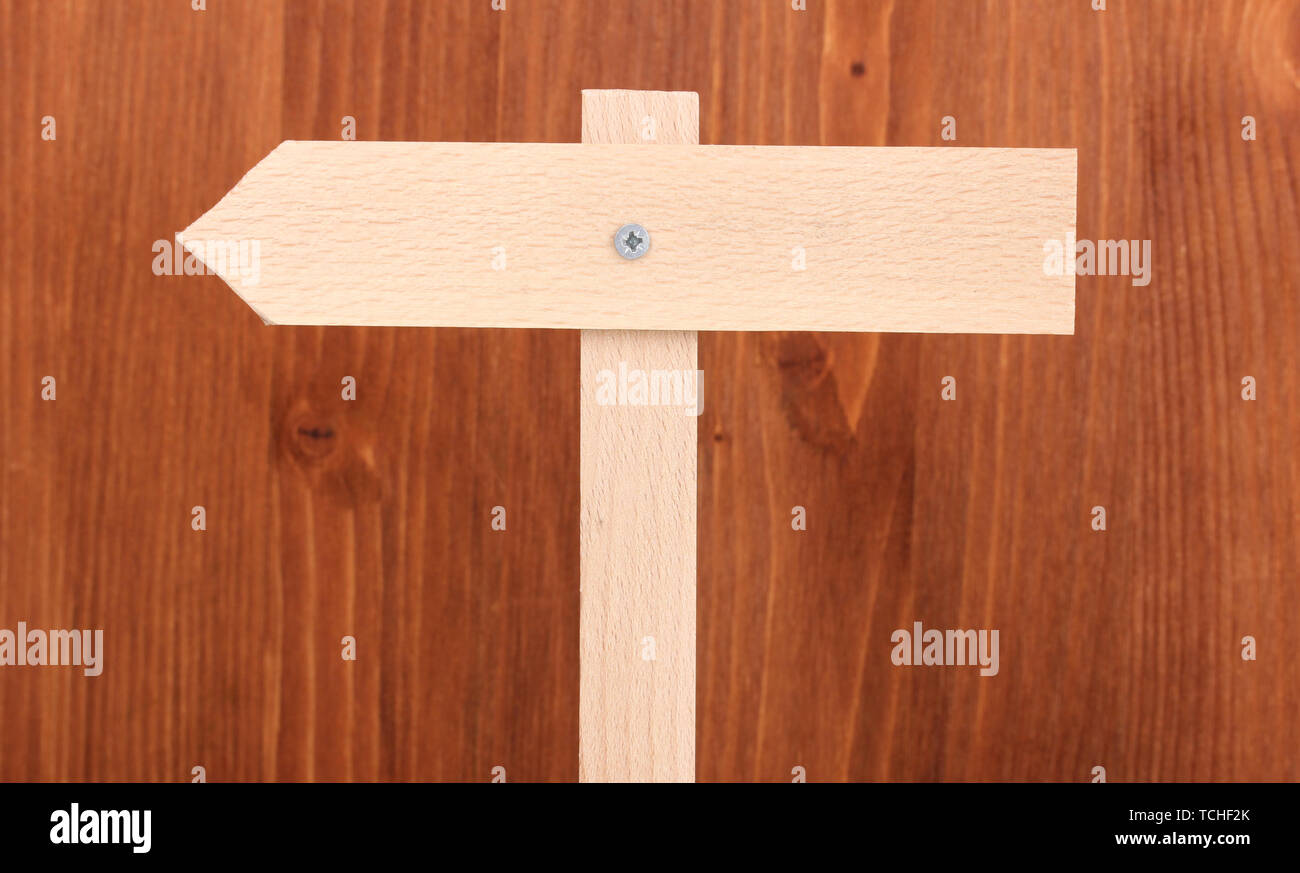 Wooden signboard on wooden background Stock Photo - Alamy
