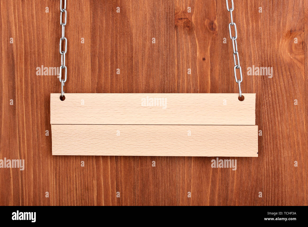 Wooden signboard on wooden background Stock Photo - Alamy