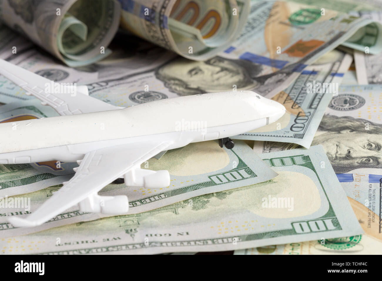 airplane on the money Stock Photo - Alamy