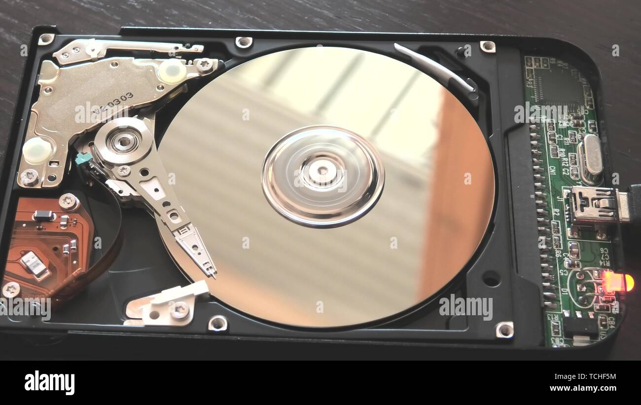 hard disk writing data with its head Stock Photo - Alamy