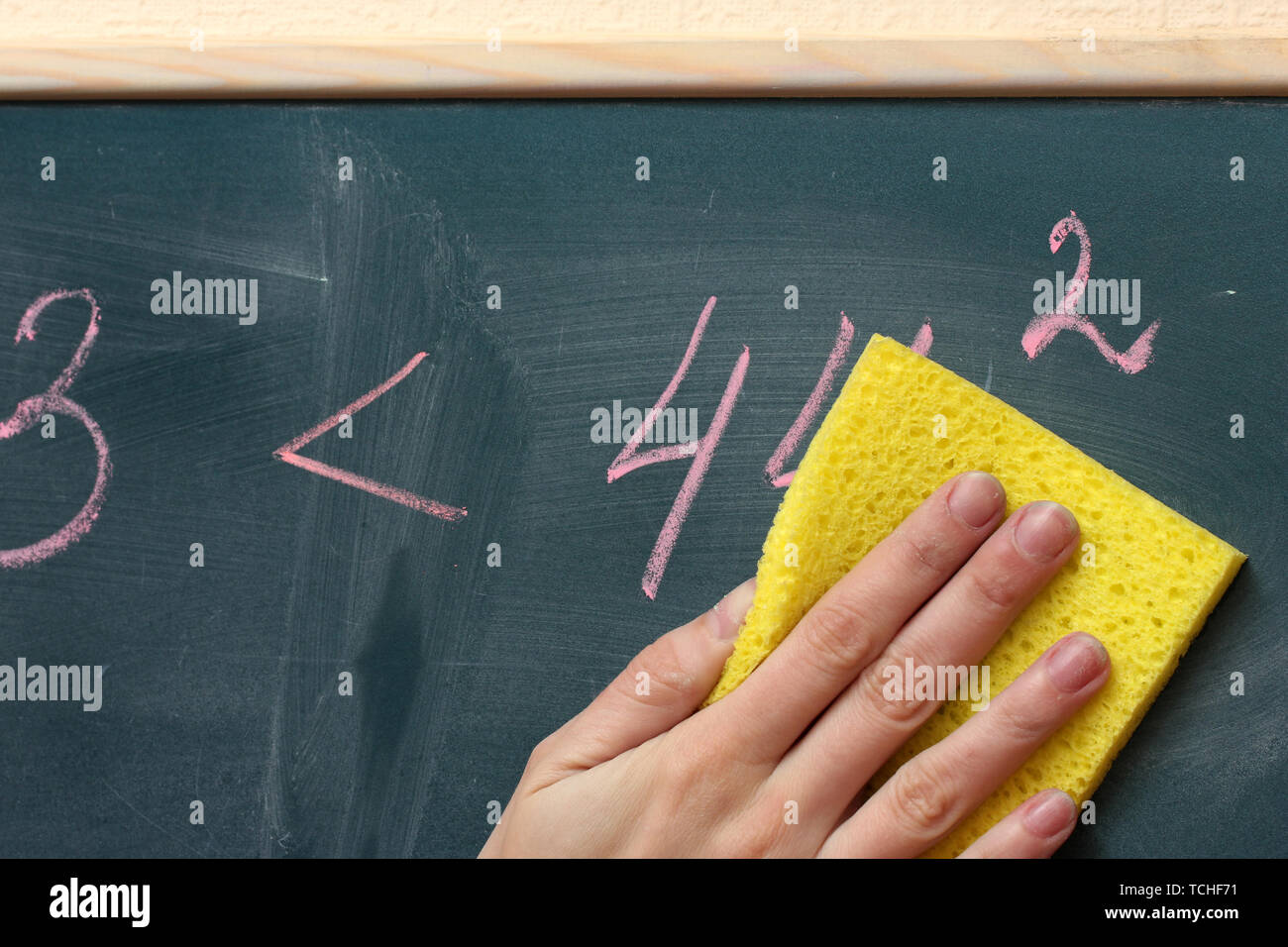 Hand writing mathematical test on the blackboard Stock Photo - Alamy