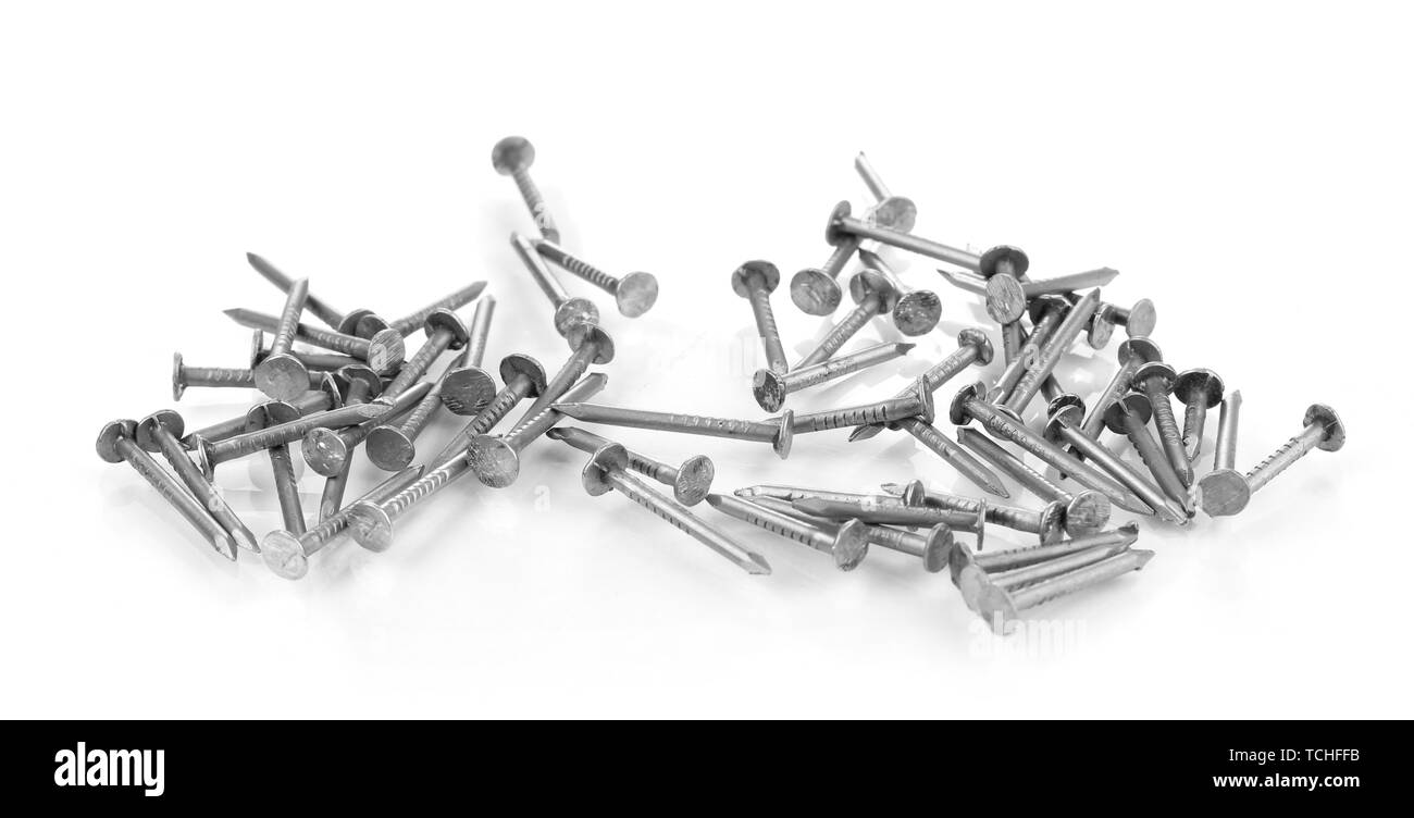 Metal nails isolated on white Stock Photo - Alamy
