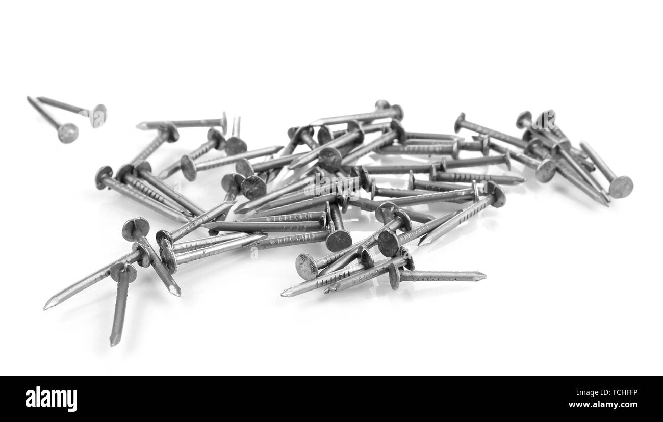 Metal nails isolated on white Stock Photo - Alamy