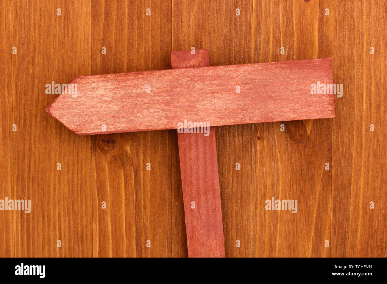 Color wooden sign board on wooden background Stock Photo - Alamy