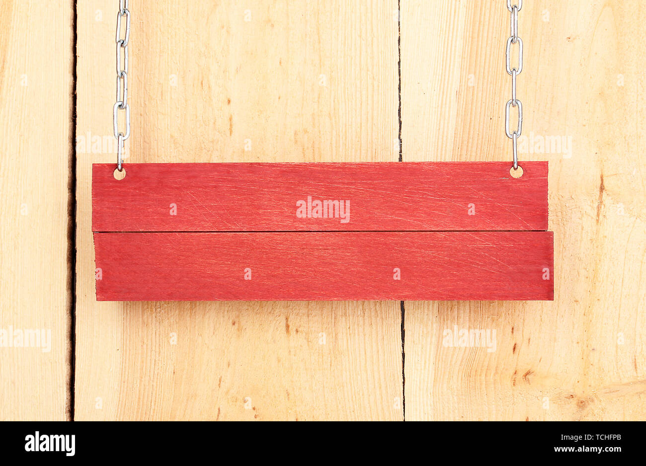 Color wooden sign board on wooden background Stock Photo - Alamy