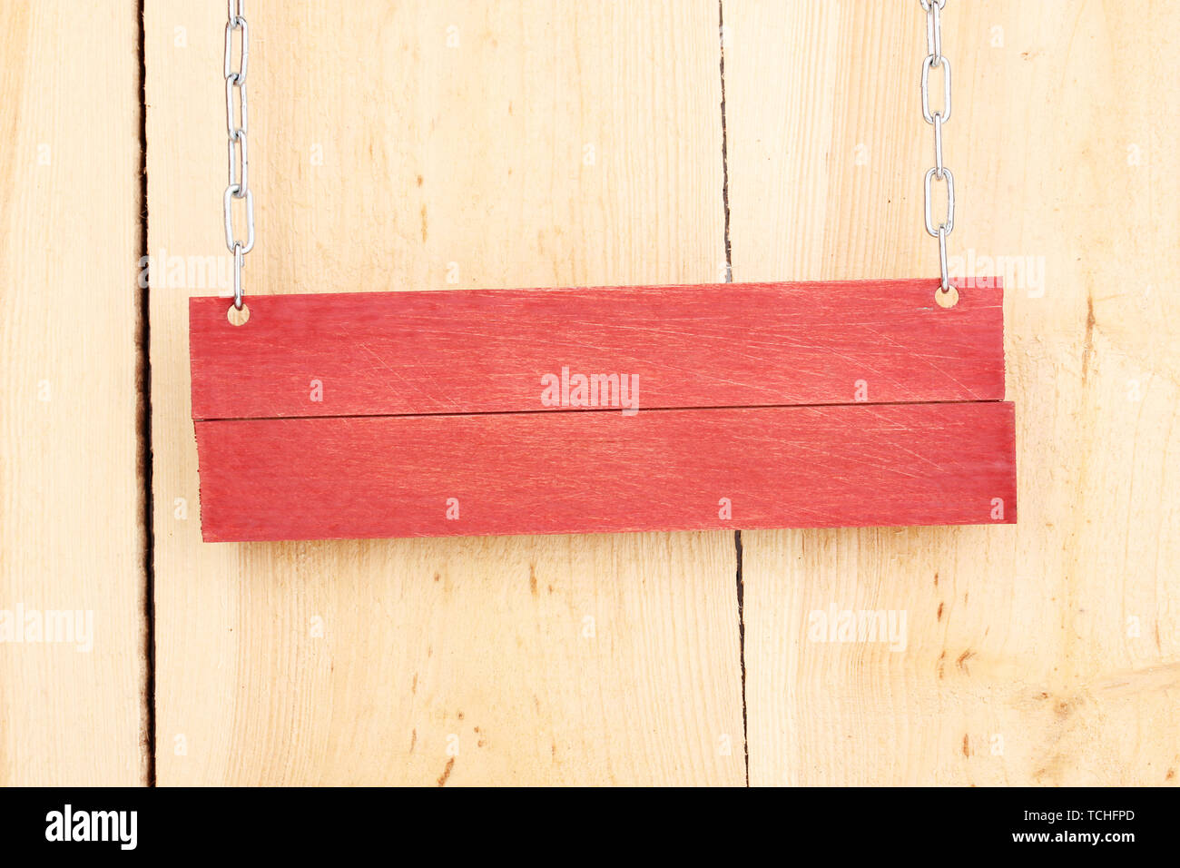 Color wooden sign board on wooden background Stock Photo - Alamy