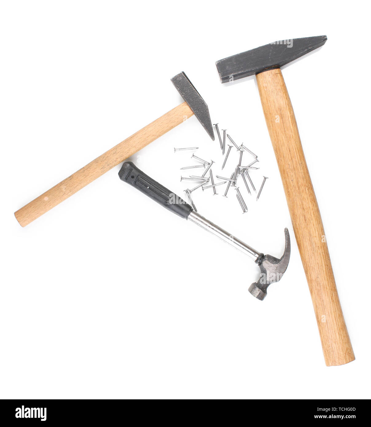 Hammers and metal nails isolated on white Stock Photo - Alamy