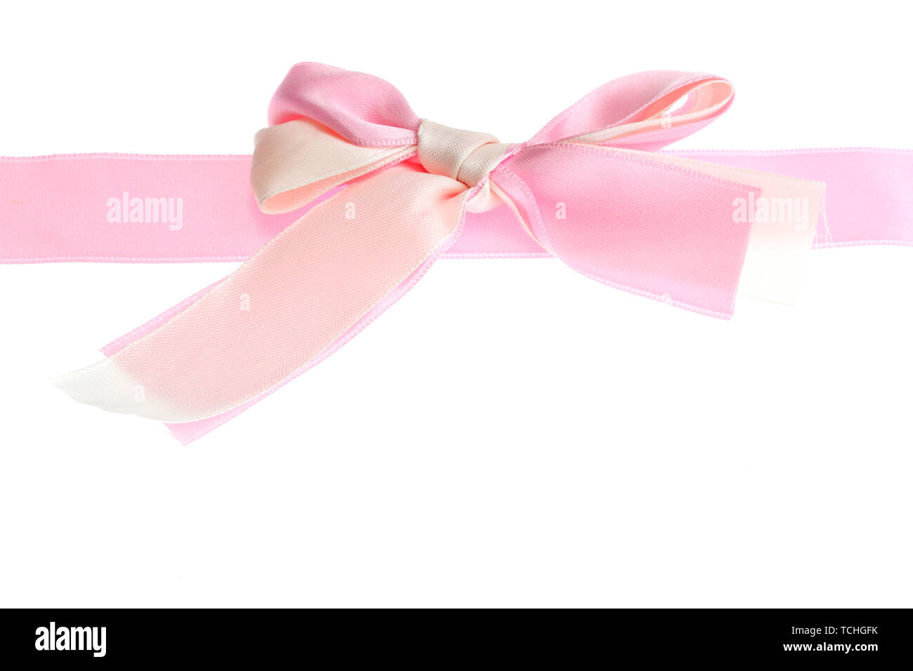 beautiful pink satin bow and ribbon isolated on white Stock Photo - Alamy