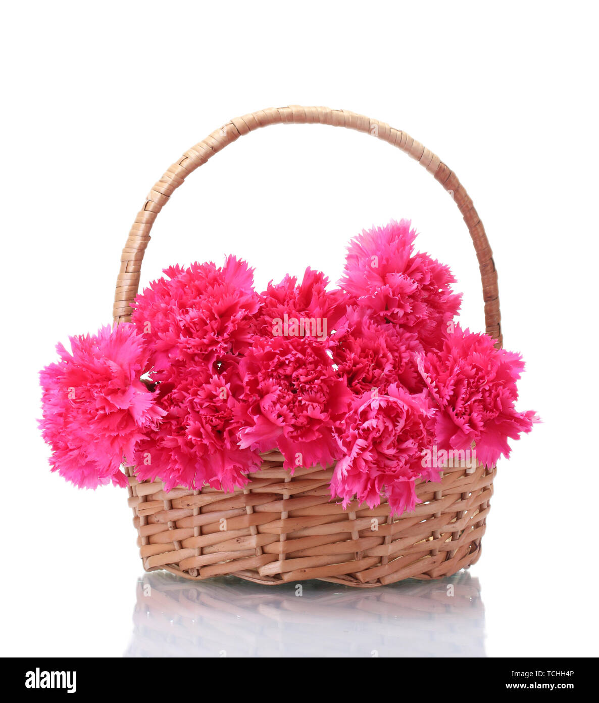 Beautiful pink carnations in basket isolated on white Stock Photo - Alamy