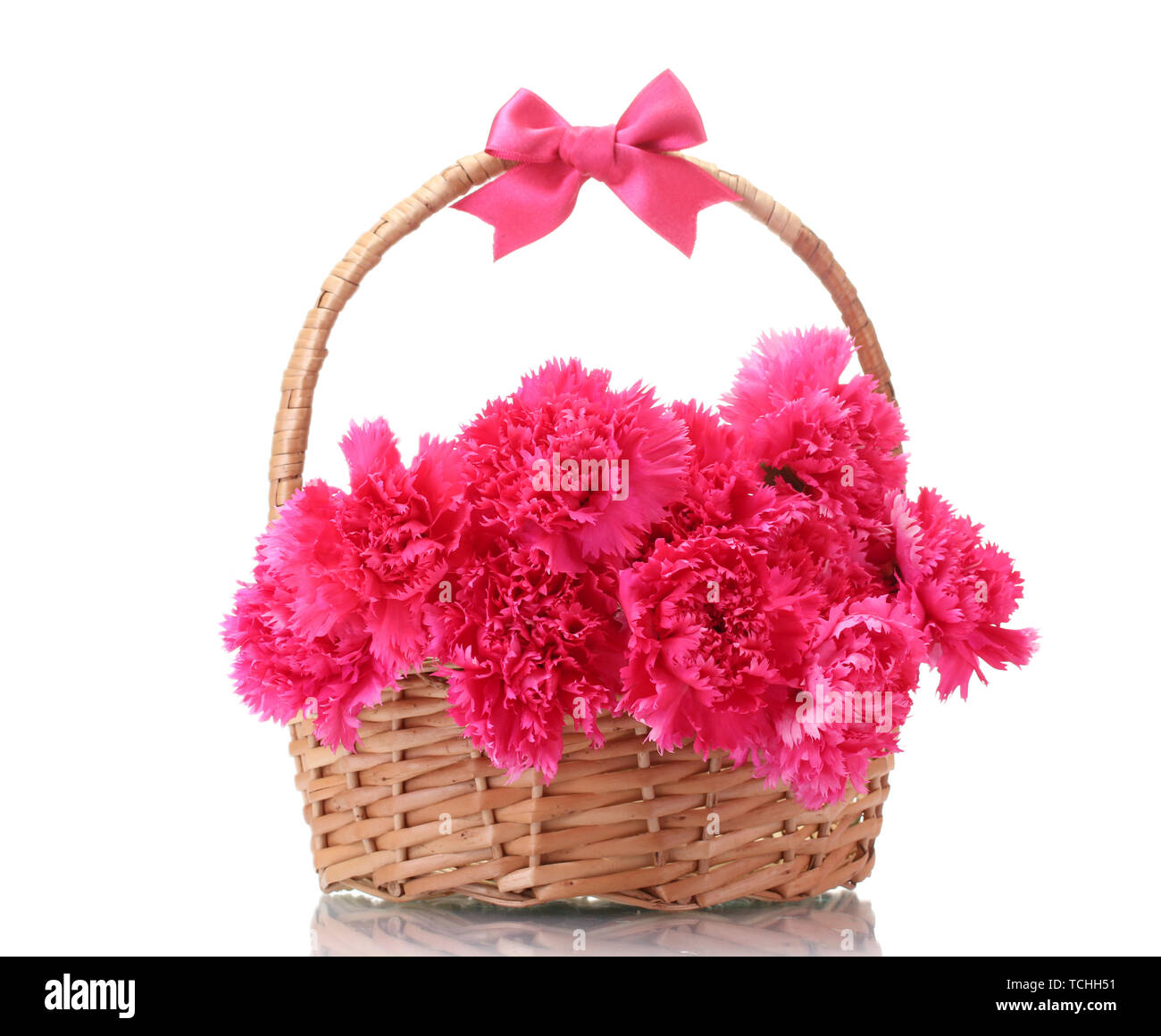 Beautiful pink carnations in basket isolated on white Stock Photo - Alamy
