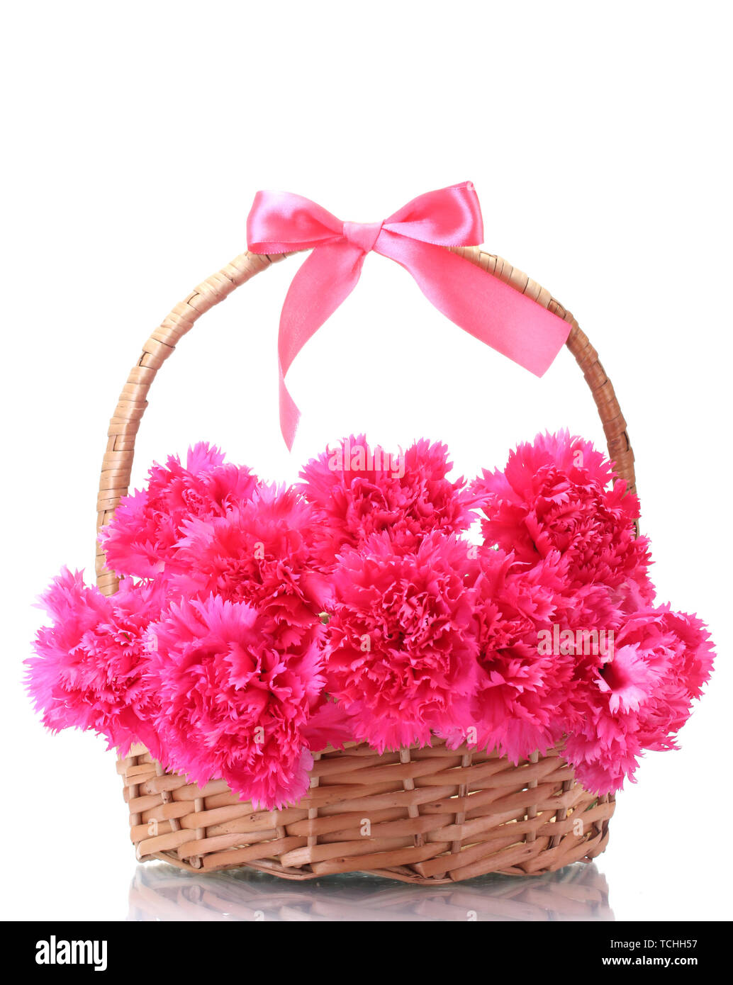 Beautiful pink carnations in basket isolated on white Stock Photo - Alamy