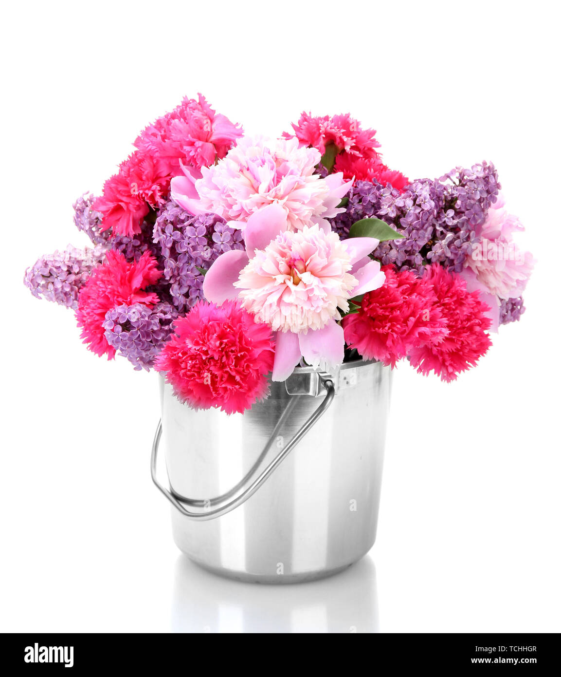 beautiful spring flowers in metal bucket isolated on white Stock Photo ...