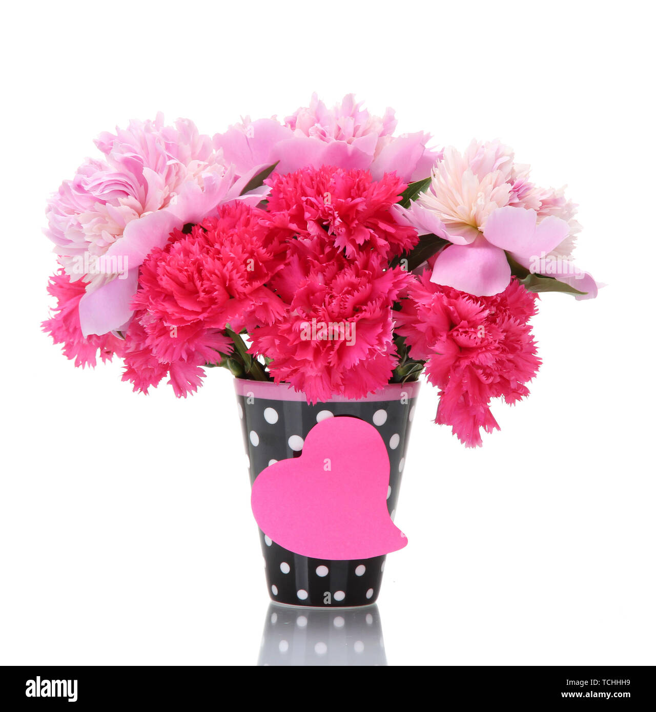 beautiful spring flowers in cup isolated on white Stock Photo - Alamy