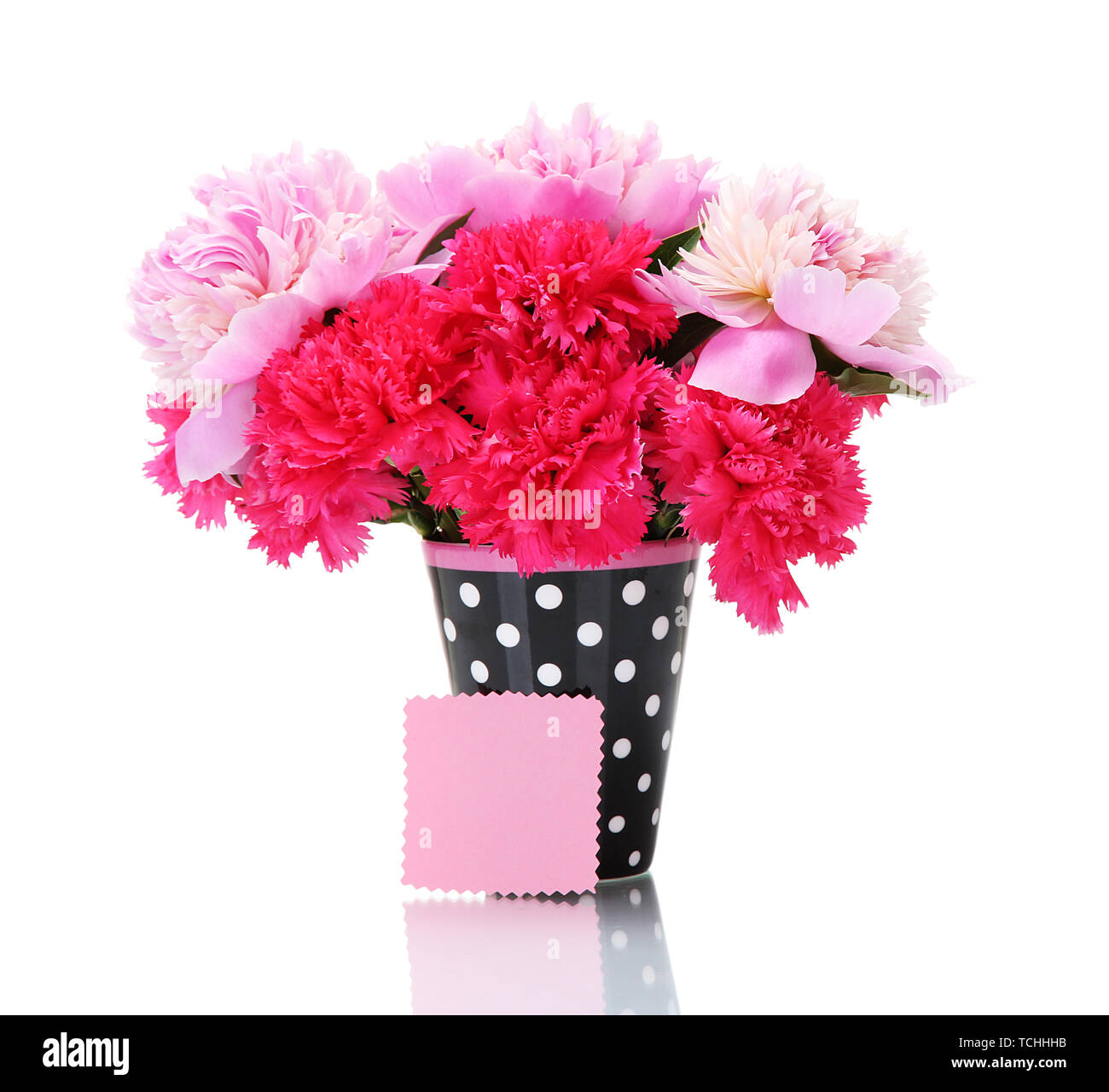 beautiful spring flowers in cup isolated on white Stock Photo - Alamy