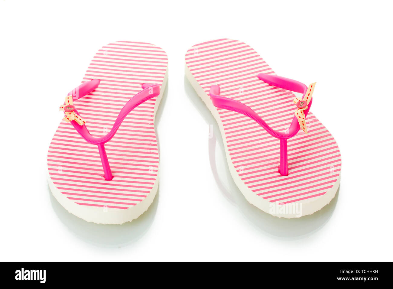pink beach shoes isolated on white Stock Photo - Alamy