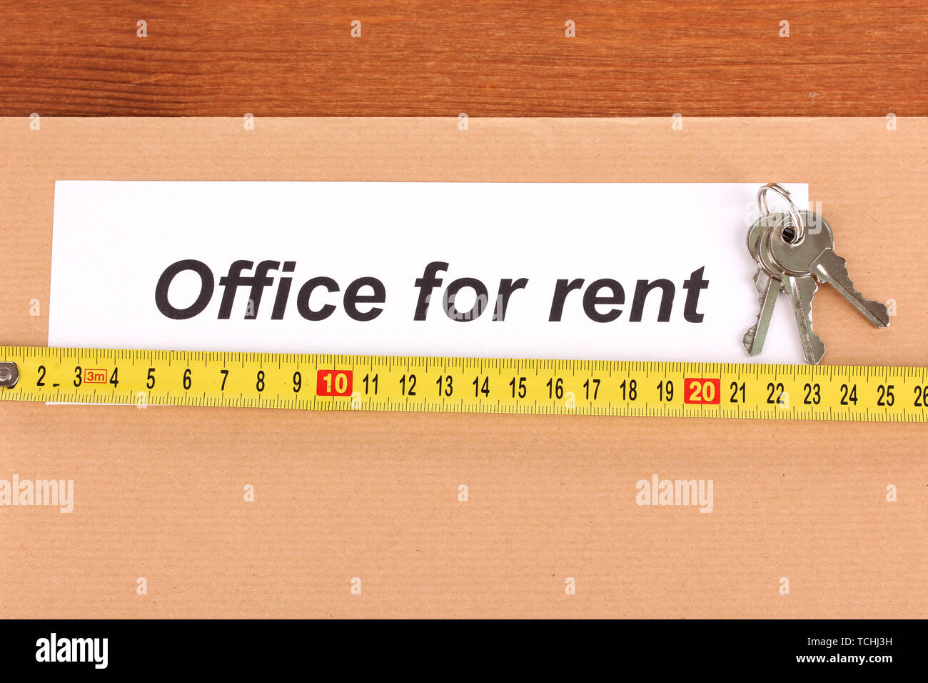 folder with information on the office leasing on wooden background ...