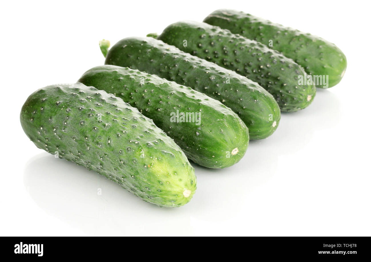 Fresh cucumbers isolated on white Stock Photo - Alamy