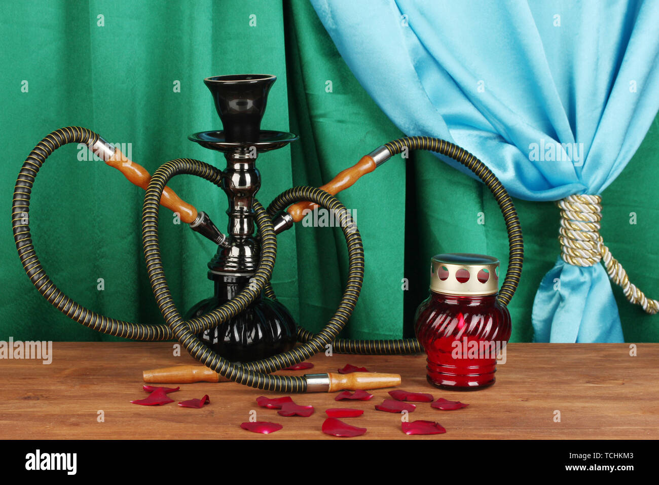hookah on a wooden table on a background of curtain close-up Stock ...