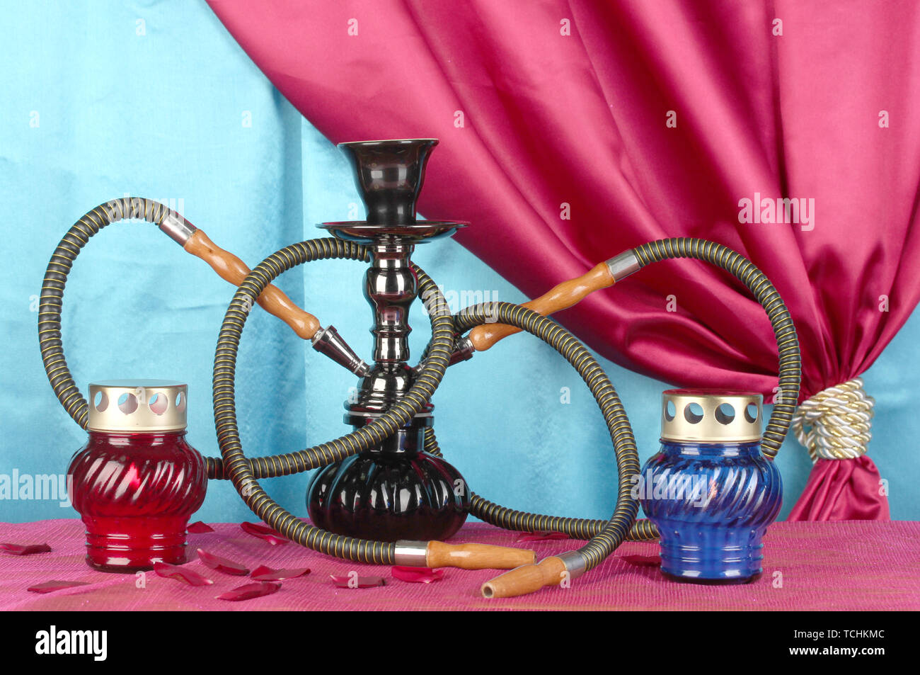 hookah on a wooden table on a background of curtain close-up Stock ...