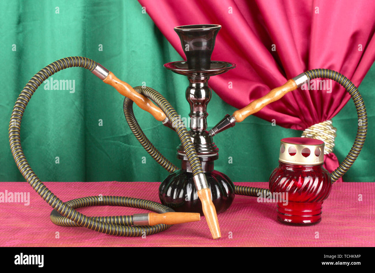 hookah on a wooden table on a background of curtain close-up Stock ...
