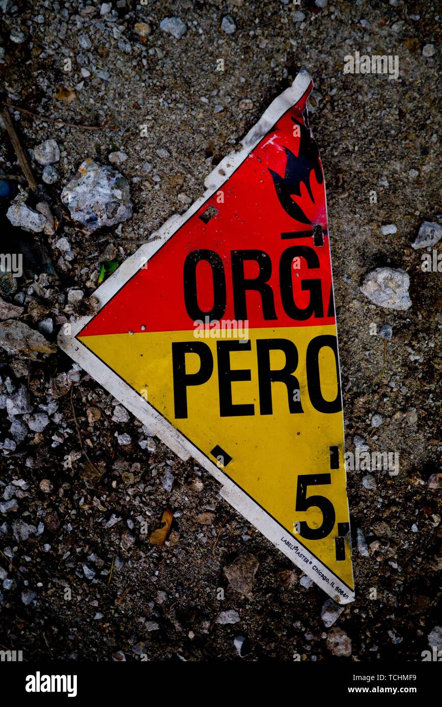 Dangerous materials sign on the ground Stock Photo - Alamy