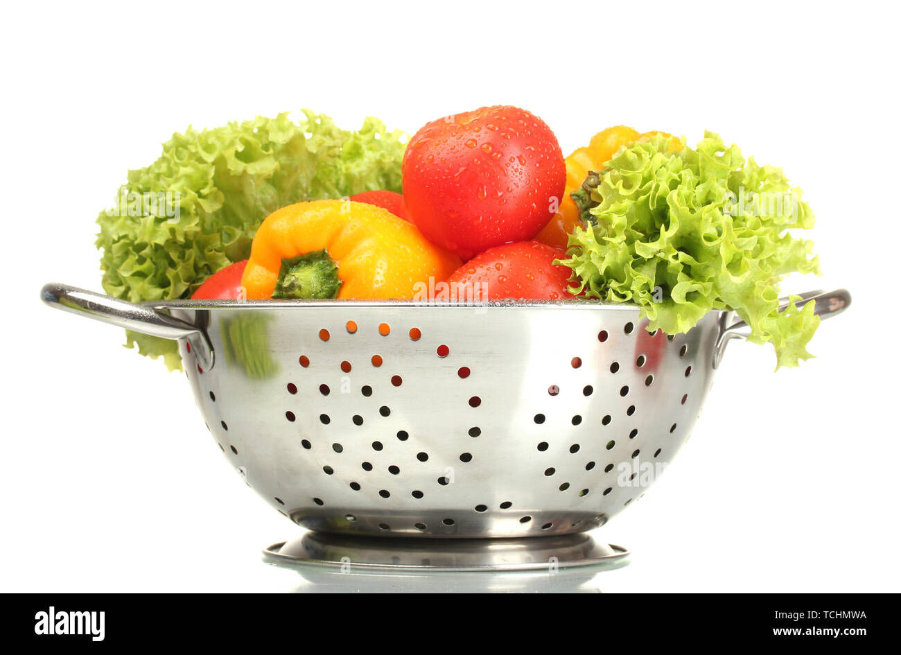 fresh vegetables in silver colander isolated on white Stock Photo - Alamy