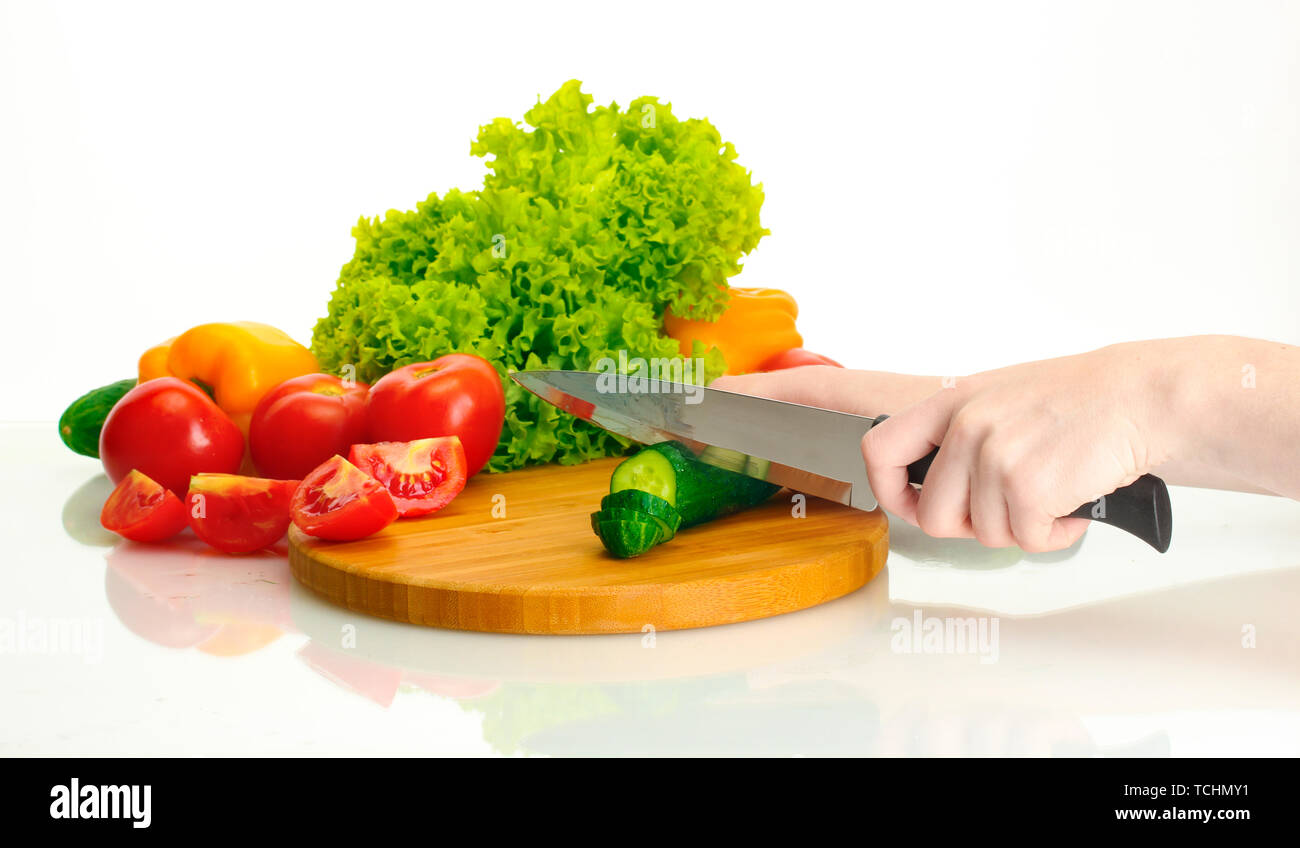 Female hands cutting yellow paprika hi-res stock photography and images ...
