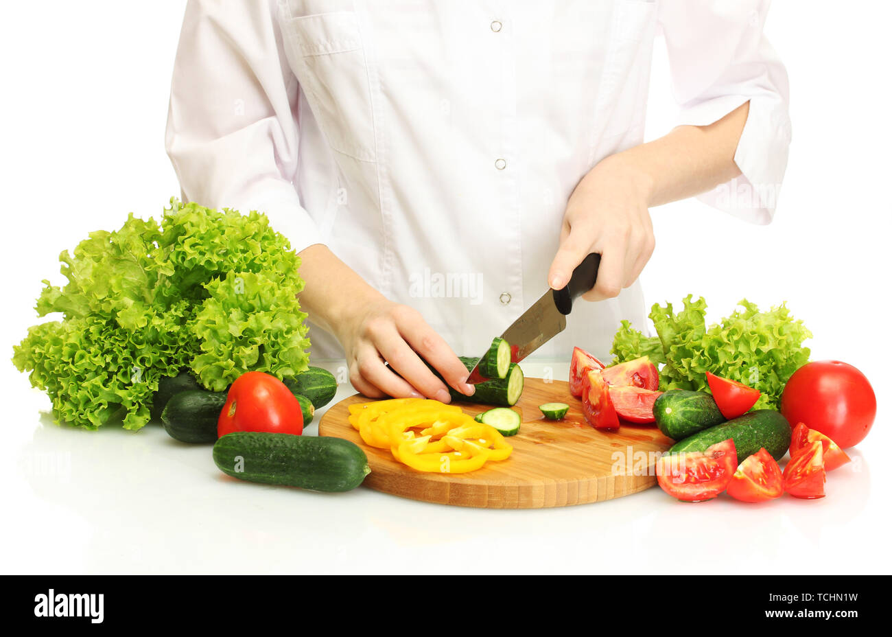 woman hands cutting vegetables on kitchen blackboard Stock Photo - Alamy