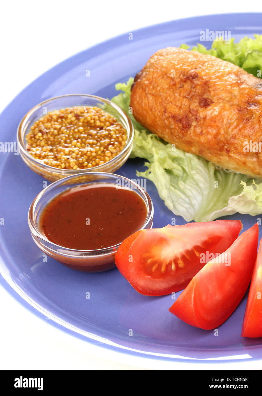 Tasty meat cutlet with garnish on plate isolated on white Stock Photo ...