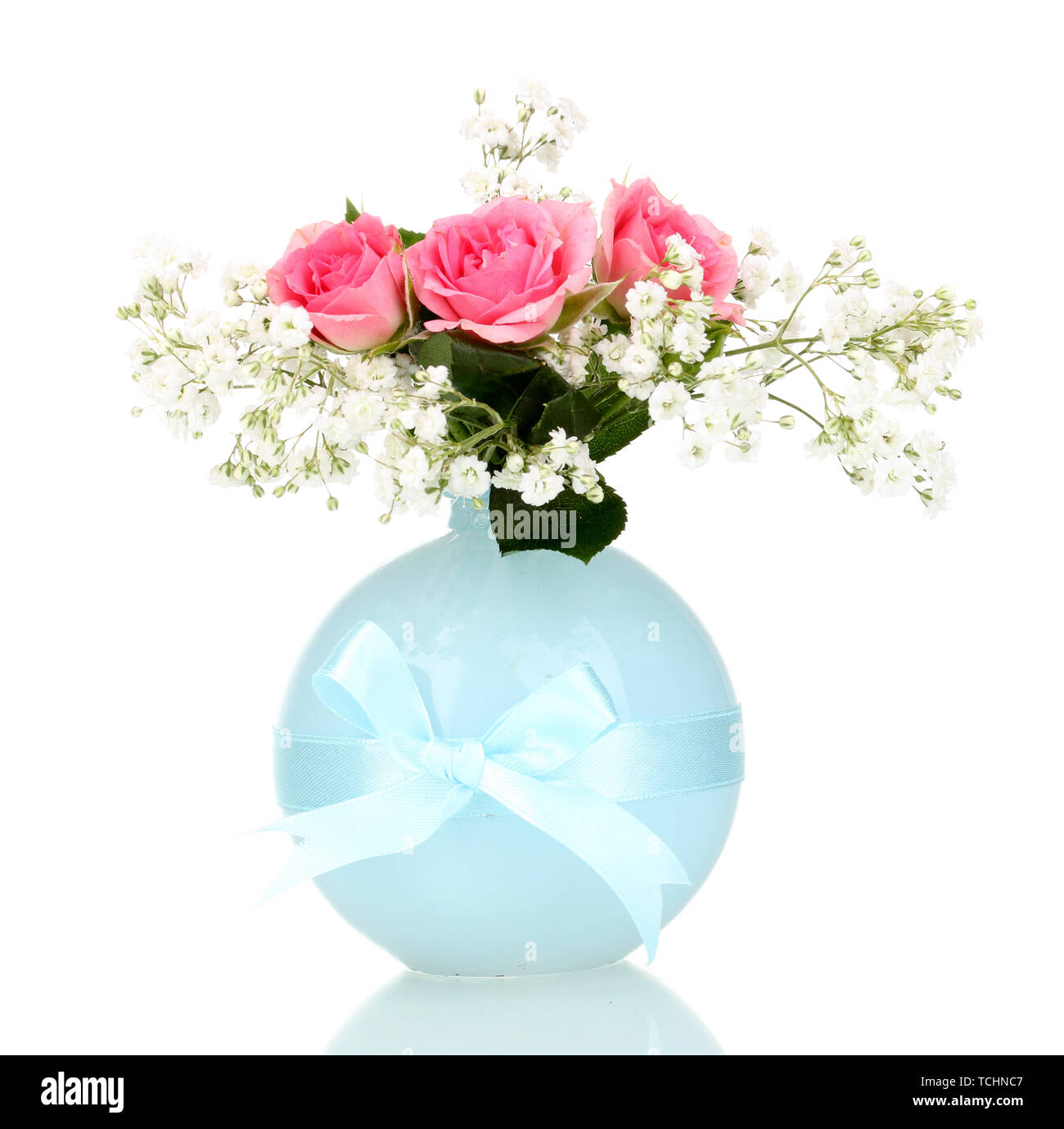 Pink roses in vase isolated on white Stock Photo - Alamy