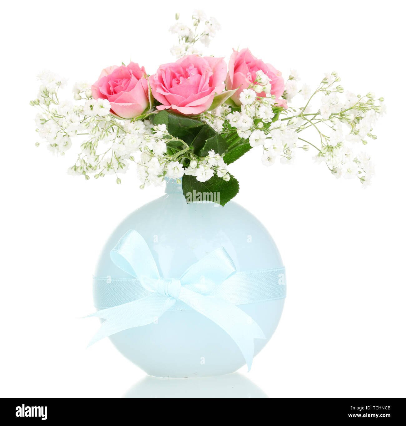 Pink roses in vase isolated on white Stock Photo - Alamy