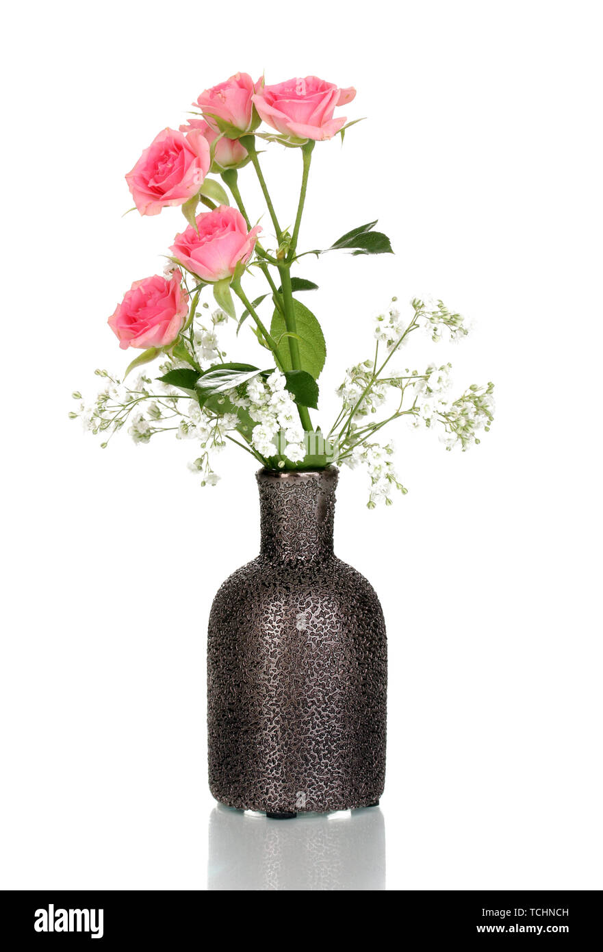 Pink roses in vase isolated on white Stock Photo - Alamy