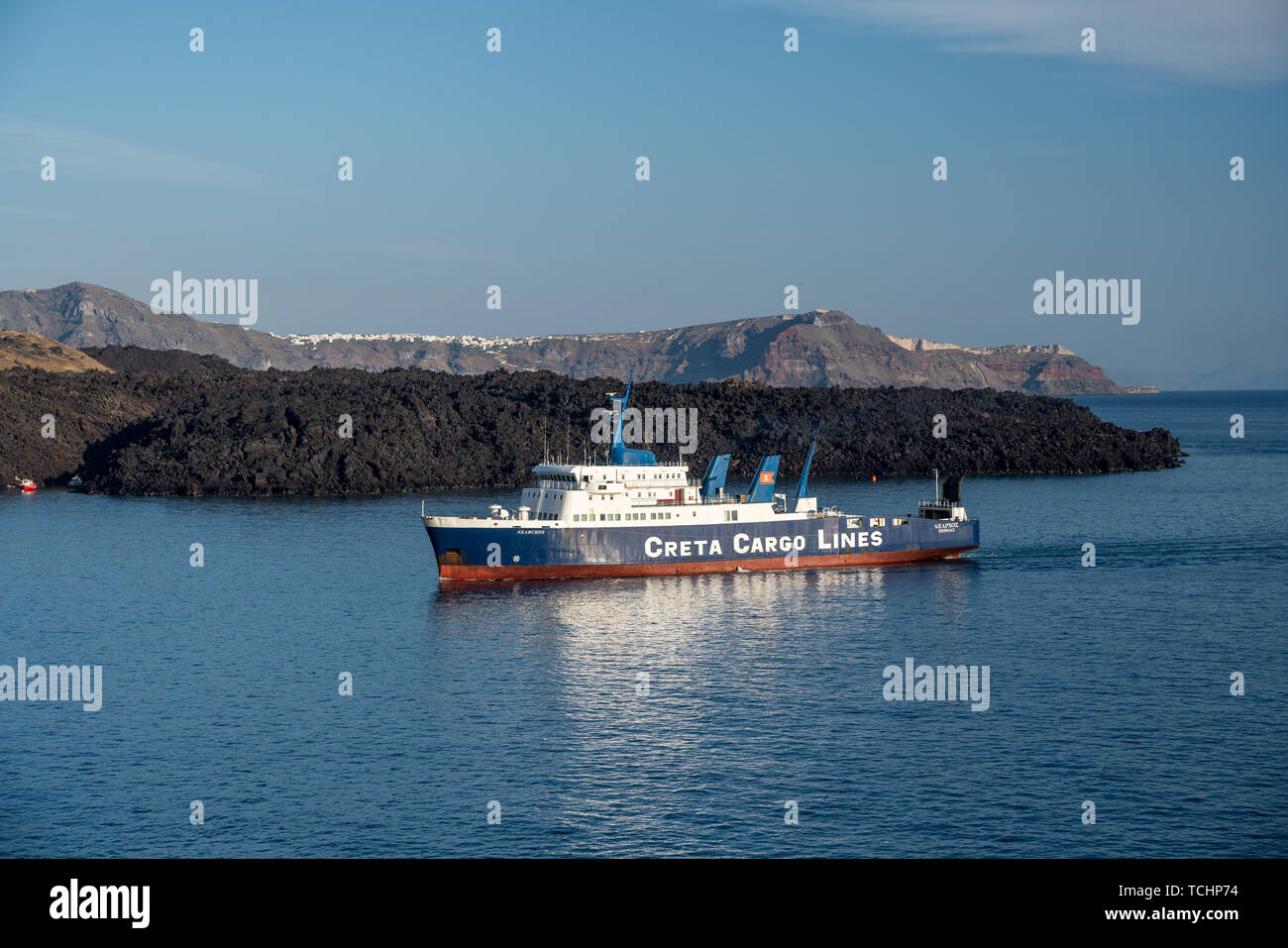 Creta Cargo Lines ship in volcanic caldera island by Santorini Stock ...