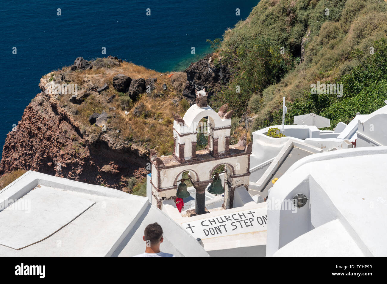 Do not step sign on roof of church in Santorini Stock Photo - Alamy