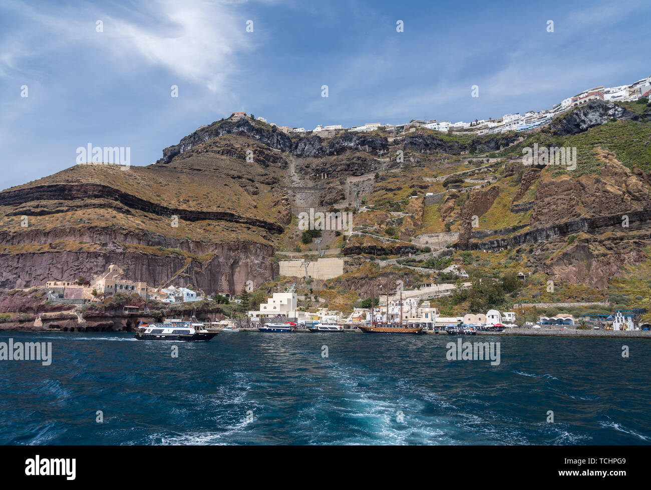Fira port on volcanic caldera island of Santorini Stock Photo - Alamy