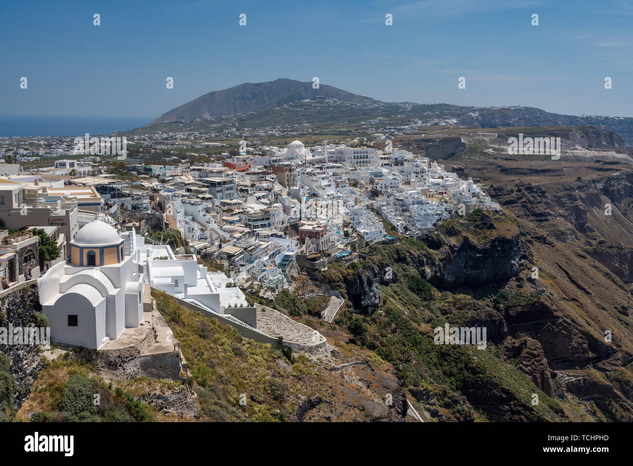 Crowded cave houses on cliff in Fira Santorini Stock Photo - Alamy