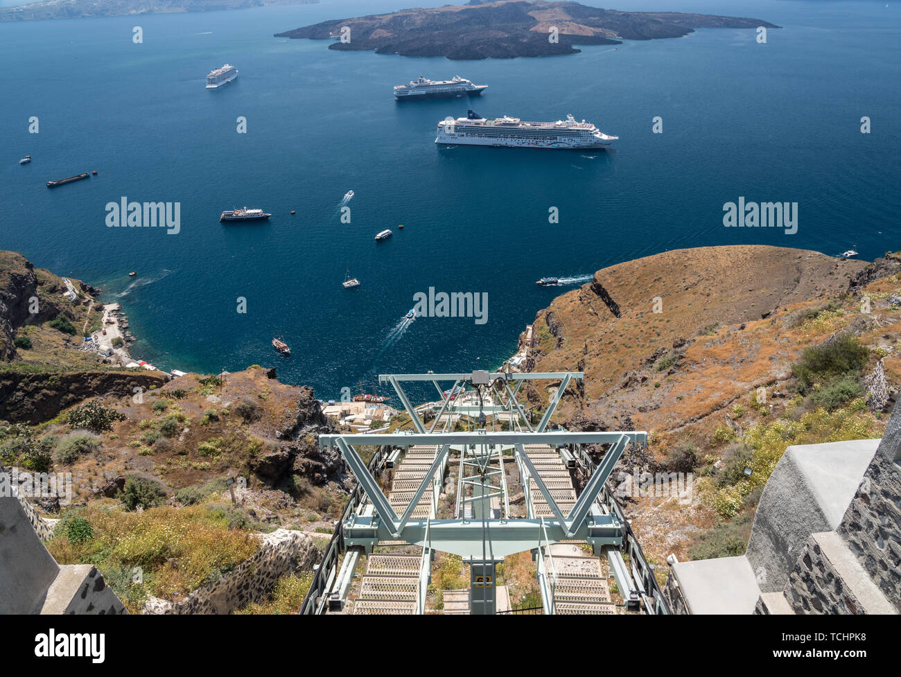 Fira port on volcanic caldera island of Santorini Stock Photo - Alamy