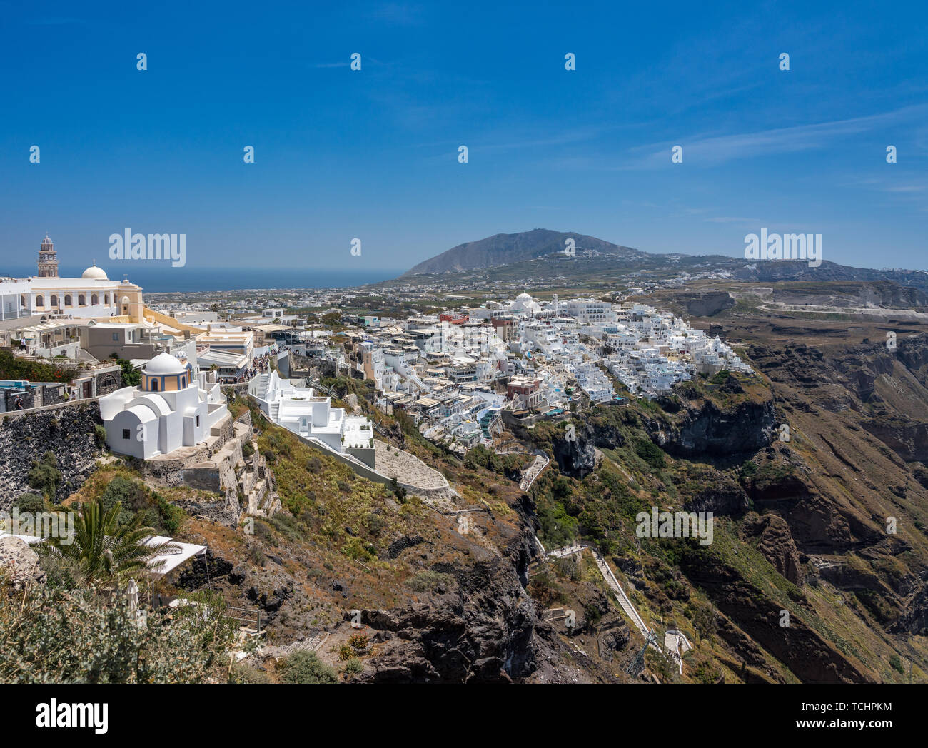 Crowded cave houses on cliff in Fira Santorini Stock Photo - Alamy