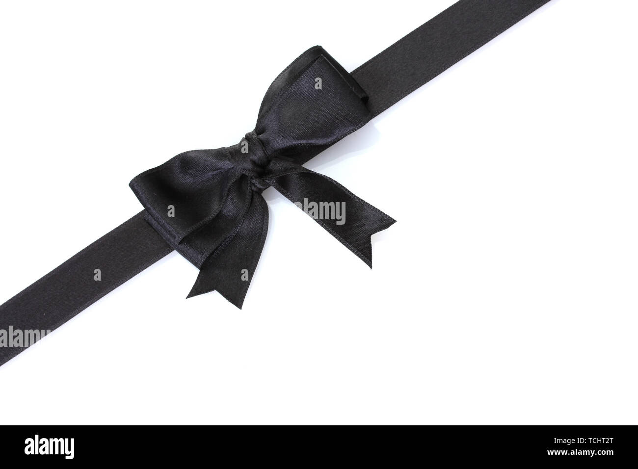 black bow on ribbon isolated on white Stock Photo - Alamy