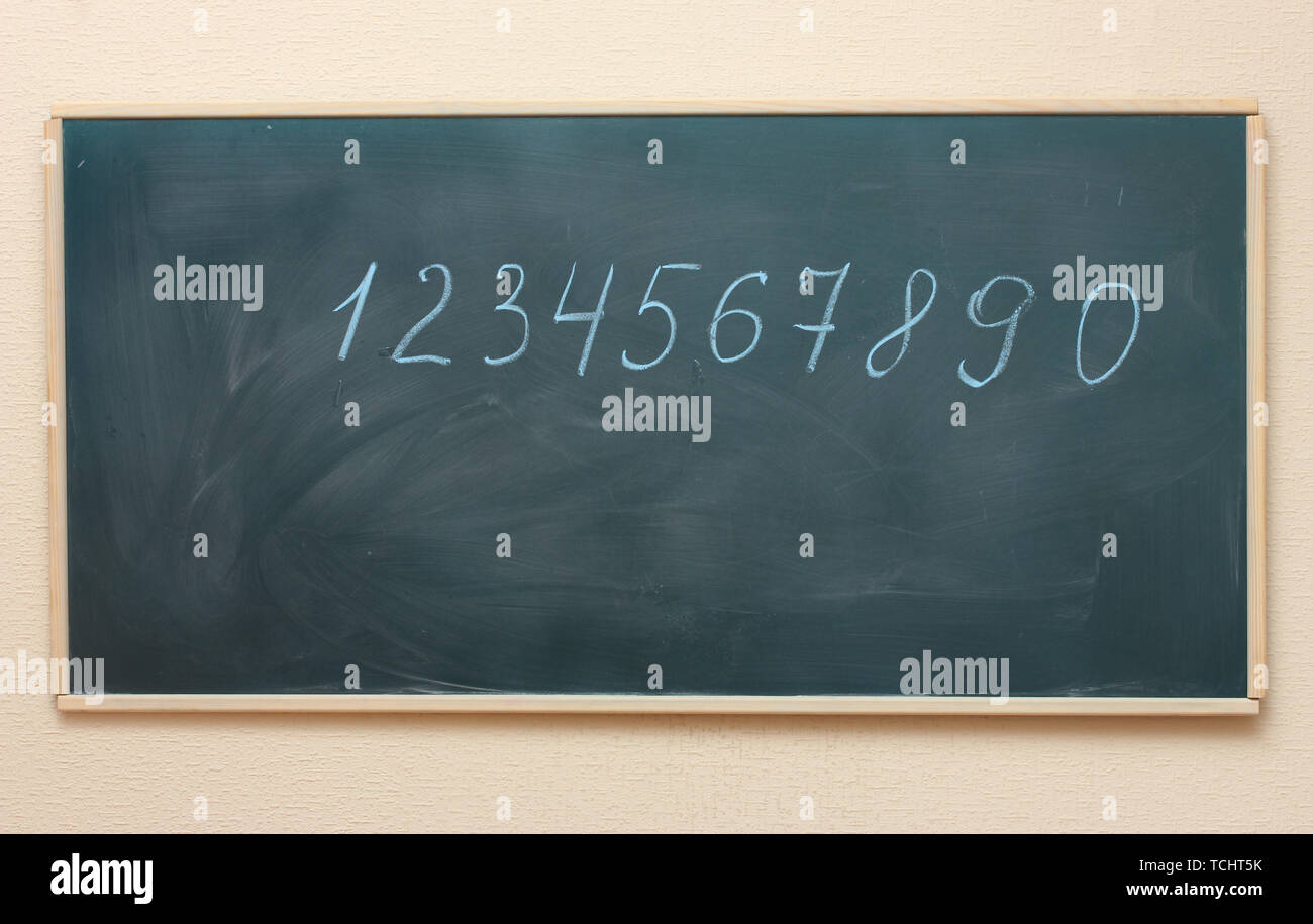 The numbers written on the desk Stock Photo - Alamy