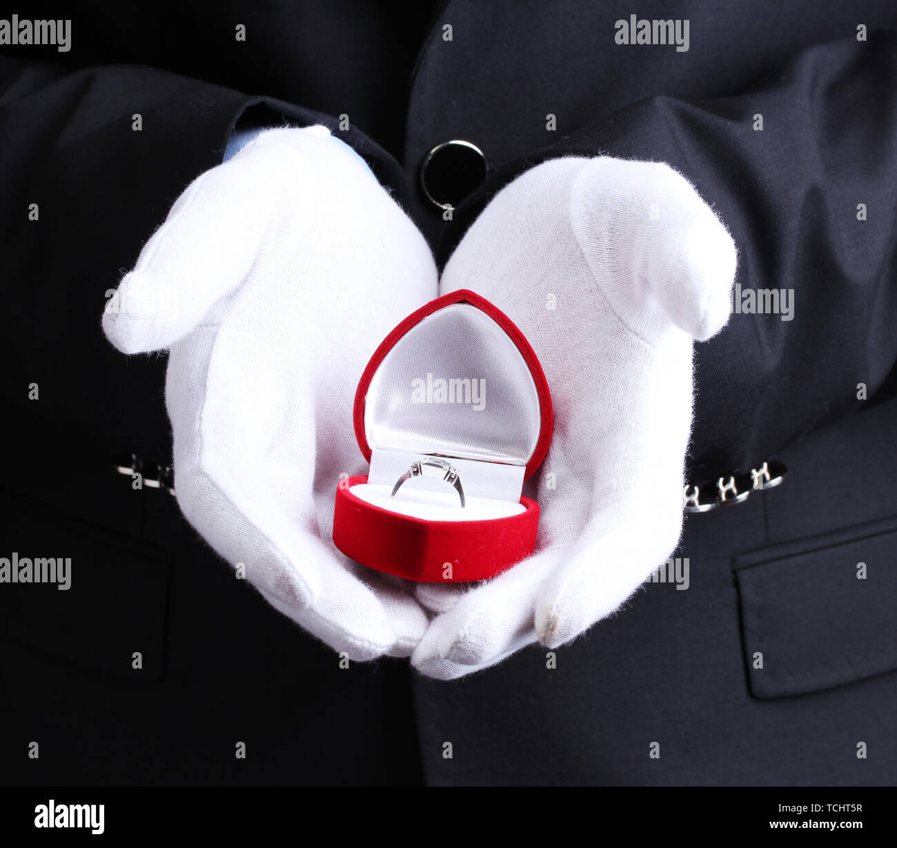 Mans hand wedding ring and box hi-res stock photography and images - Alamy