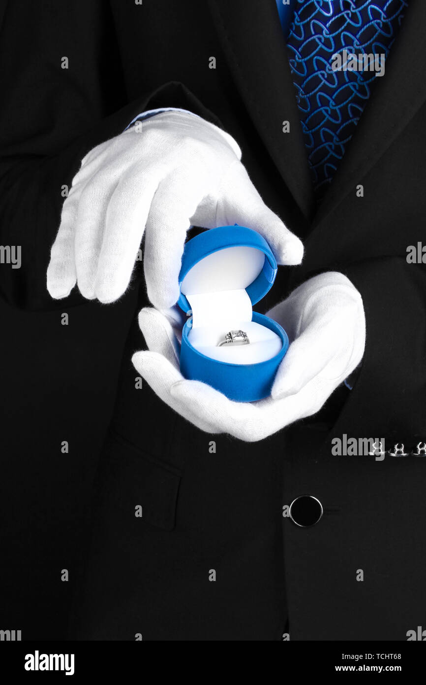 Mans hand wedding ring and box hi-res stock photography and images - Alamy
