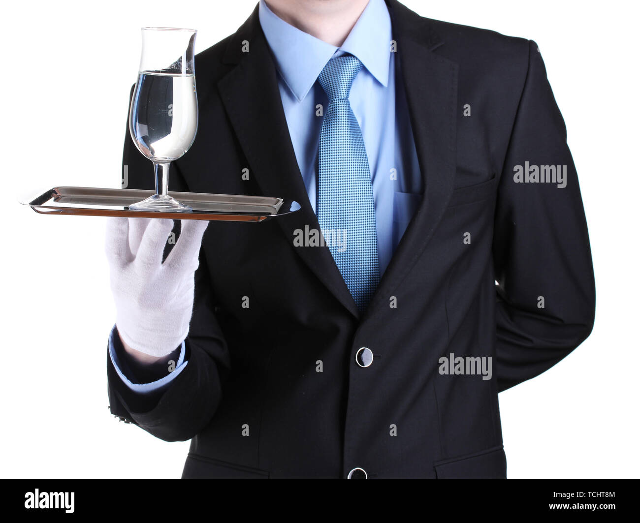 formal waiter with a glass of water on silver tray isolated on white ...
