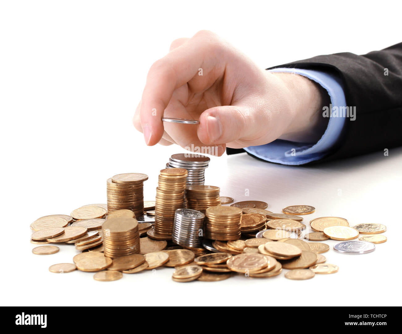 Hand put stack coins money hi-res stock photography and images - Alamy