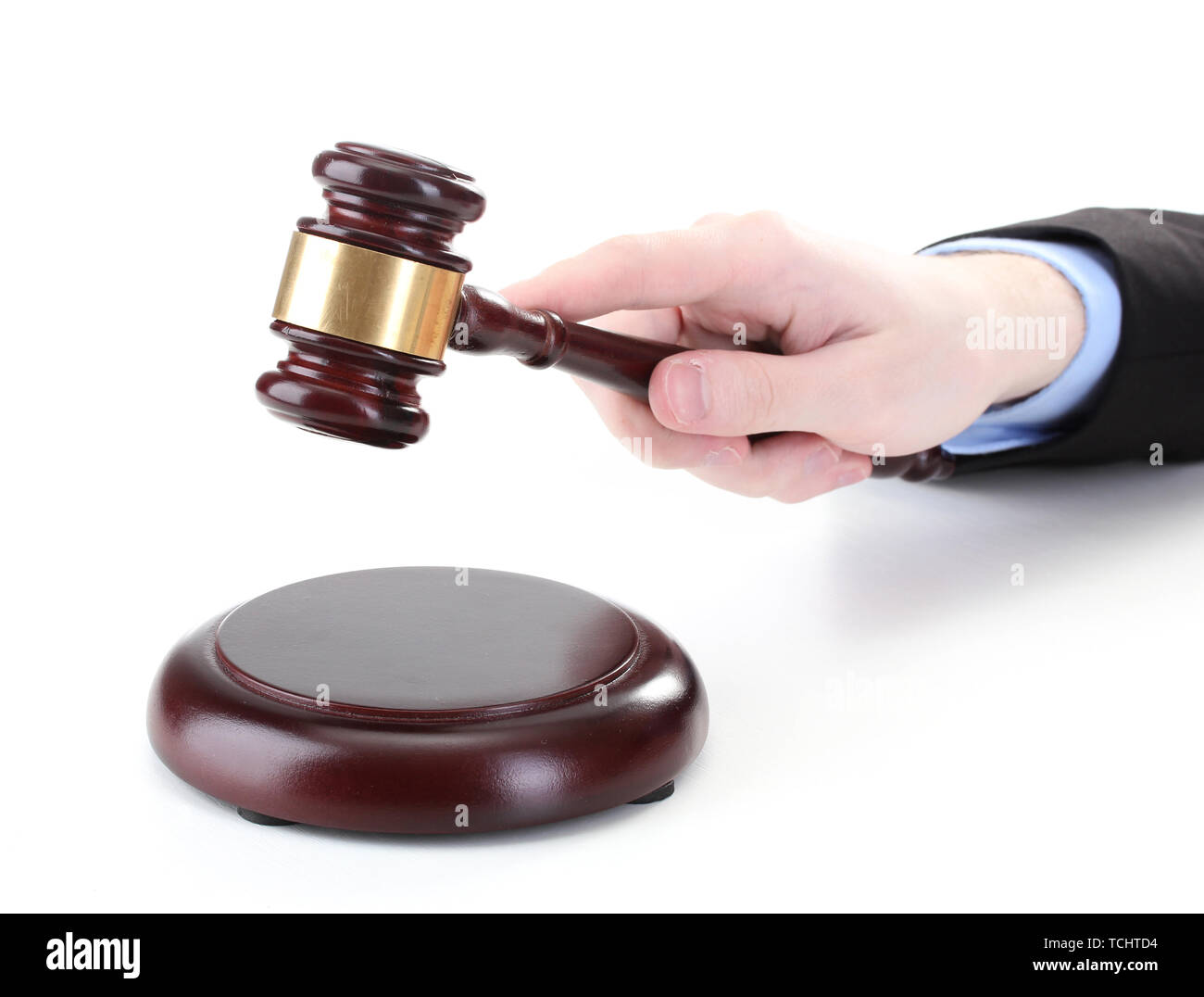 wooden gavel in hand isolated on white Stock Photo - Alamy