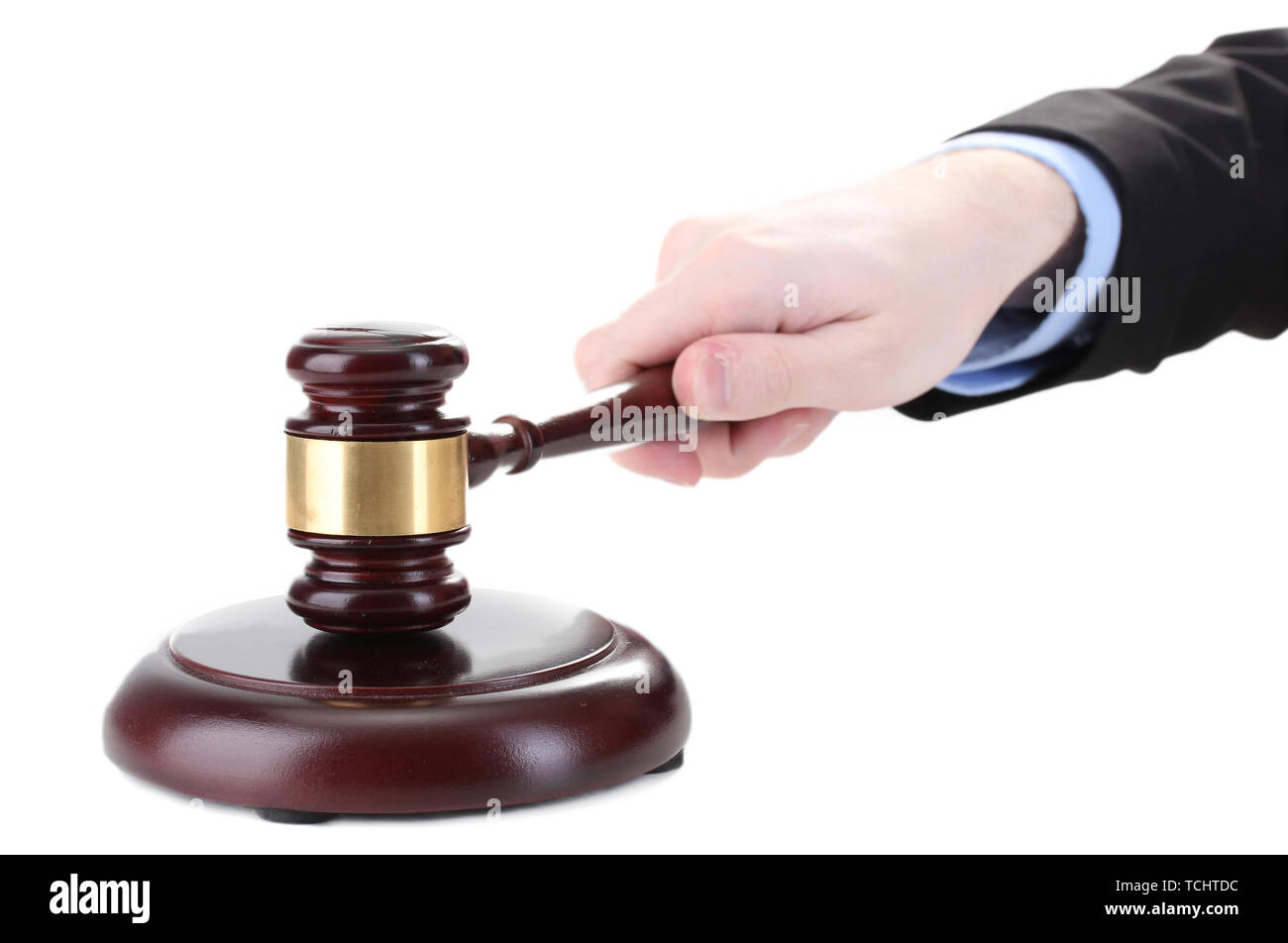 wooden gavel in hand isolated on white Stock Photo - Alamy